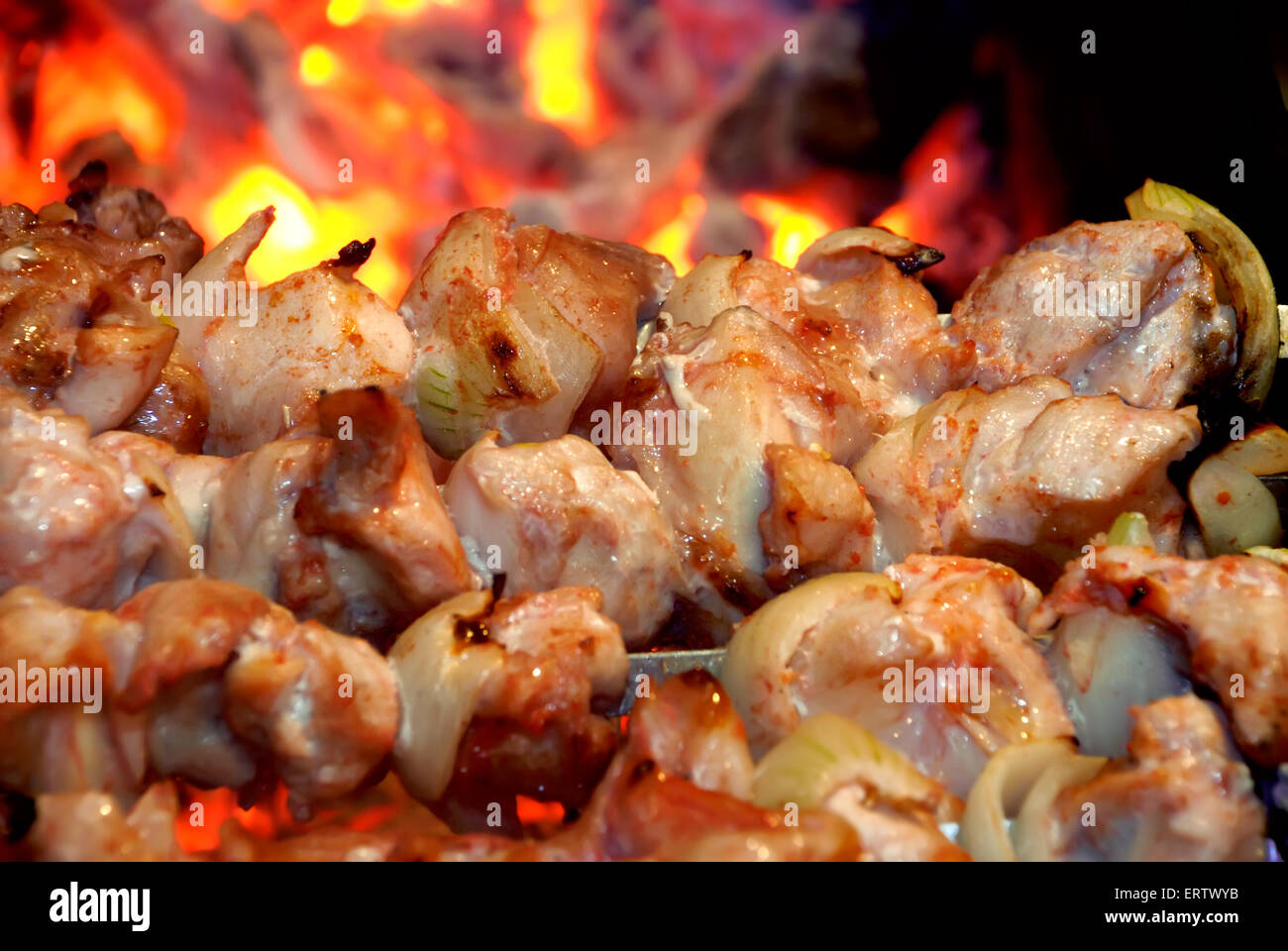 Traditional preparation of a shish kebab on fire Stock Photo - Alamy