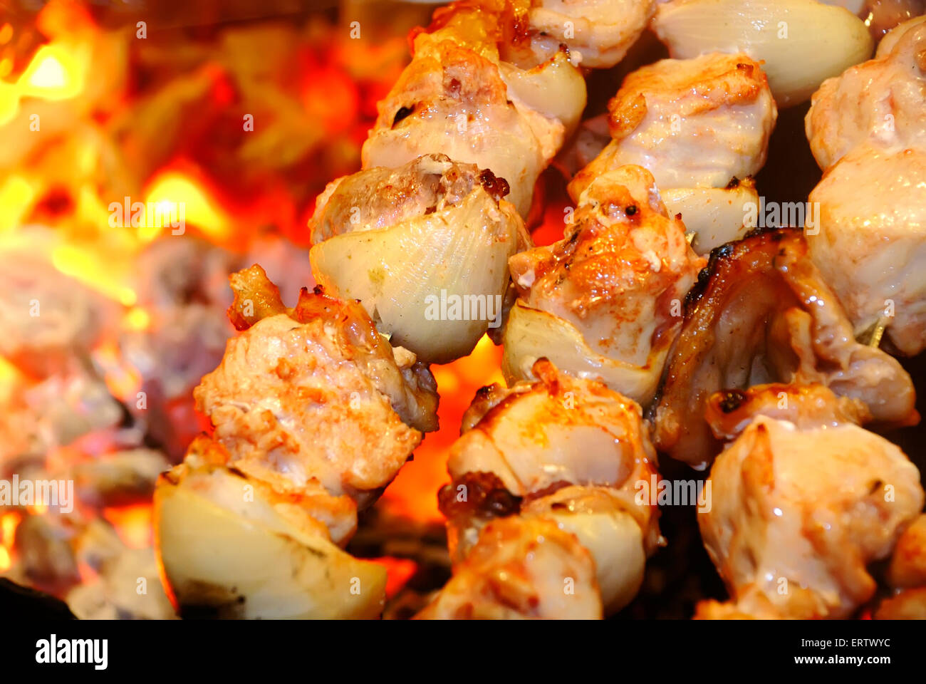 Traditional preparation of a shish kebab on fire Stock Photo - Alamy