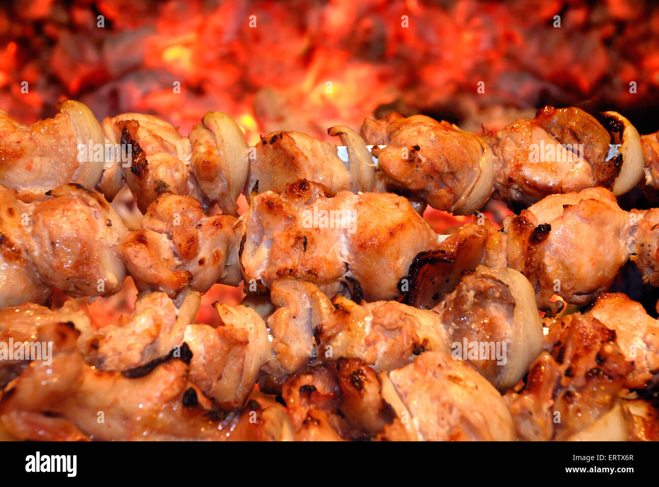 Traditional preparation of a shish kebab on fire Stock Photo - Alamy