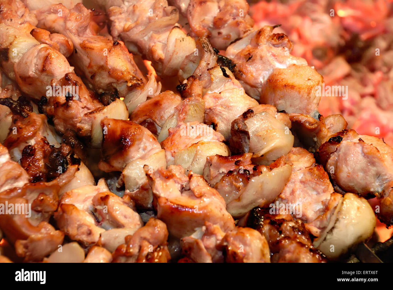 Traditional preparation of a shish kebab on fire Stock Photo - Alamy