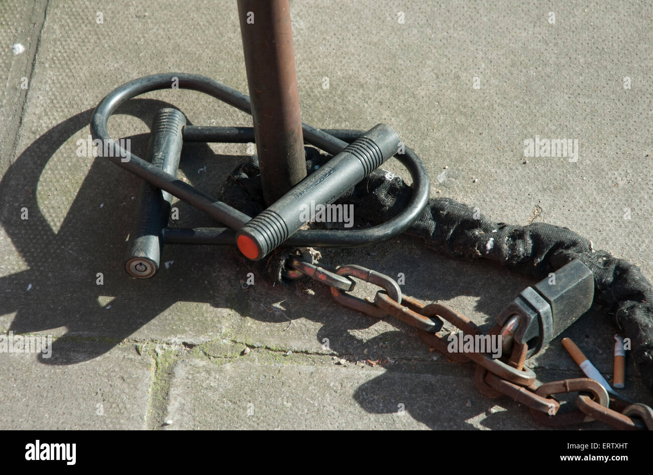 Discarded bicycle locks in bicycle parking area Stock Photo - Alamy