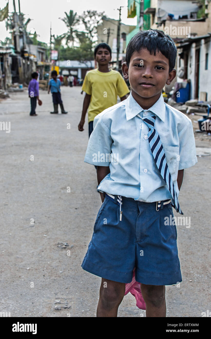 Portrait of young boy in the slums of Bangalore, India Stock Photo - Alamy