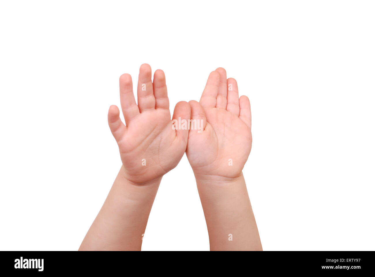 Two children's hands palms upwards on white isolated Stock Photo - Alamy