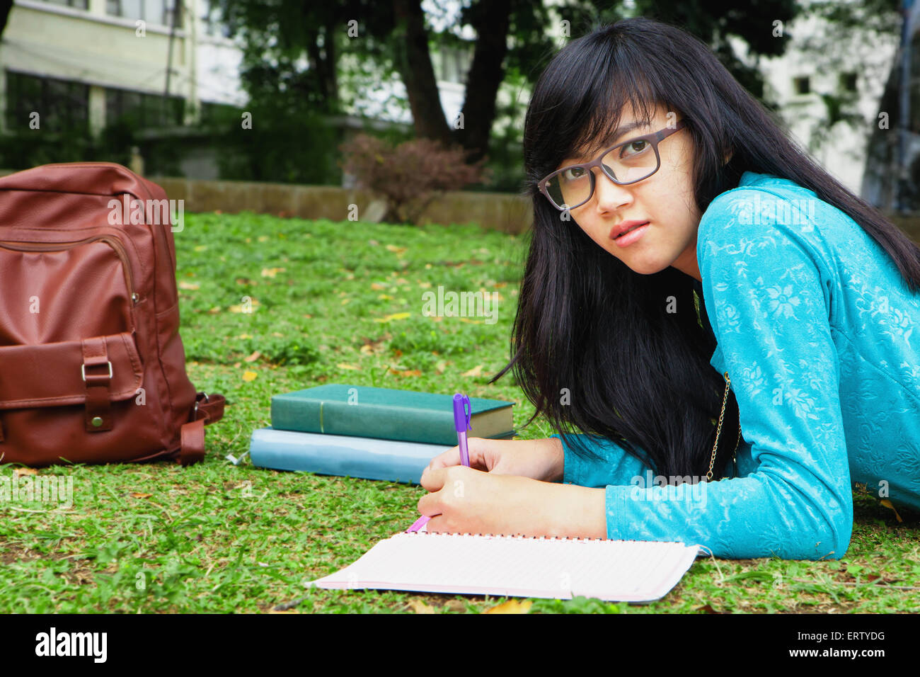 College student writing hi-res stock photography and images - Alamy