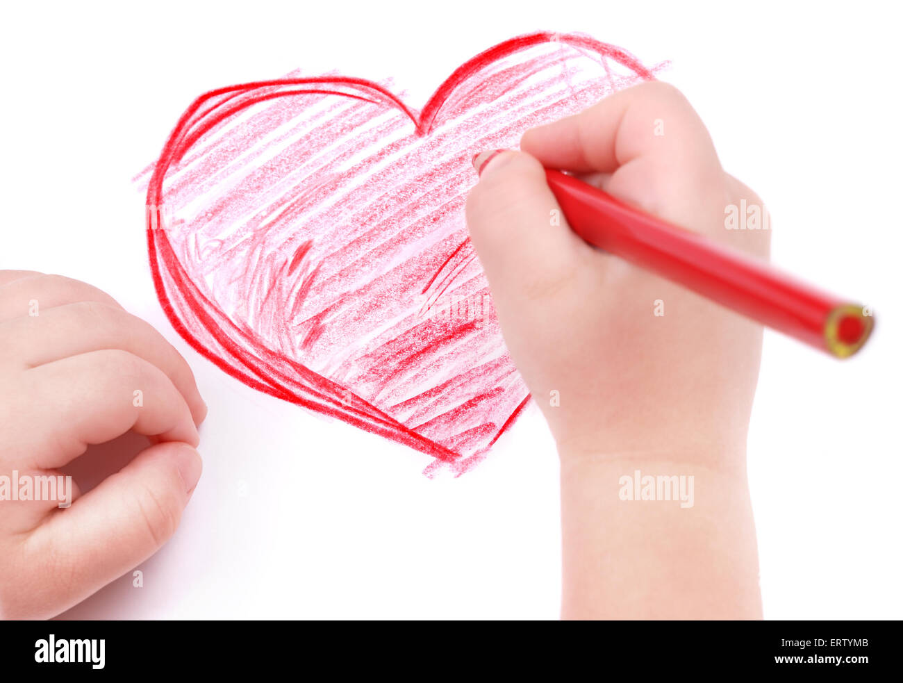 Childrens hand with pencil draws the heart, isolated Stock Photo - Alamy