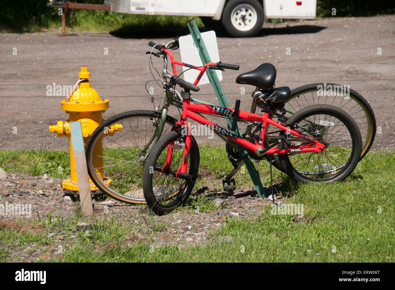 Children's bicycles chained Stock Photo - Alamy