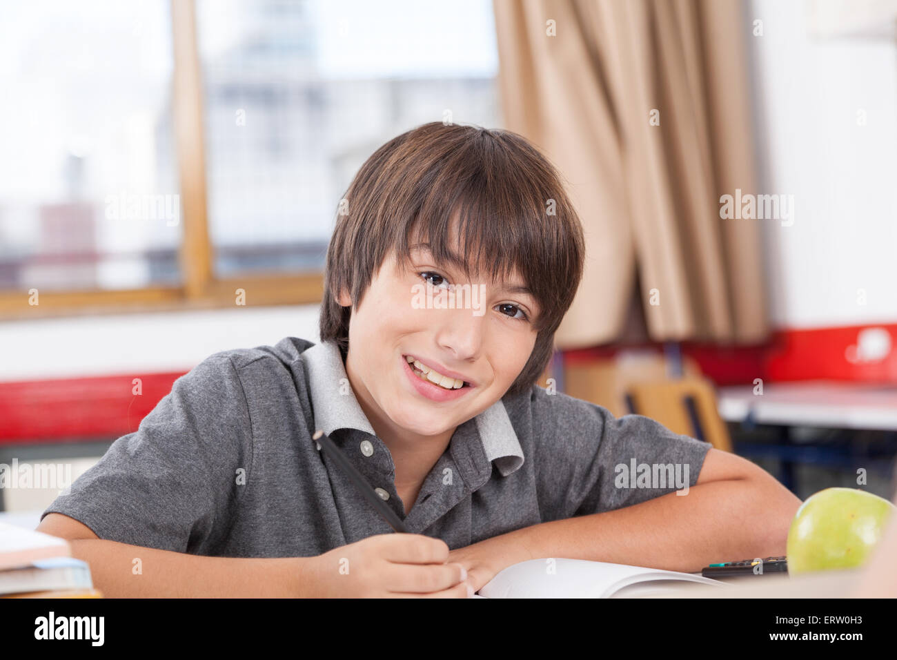 Boy in the class room Stock Photo - Alamy