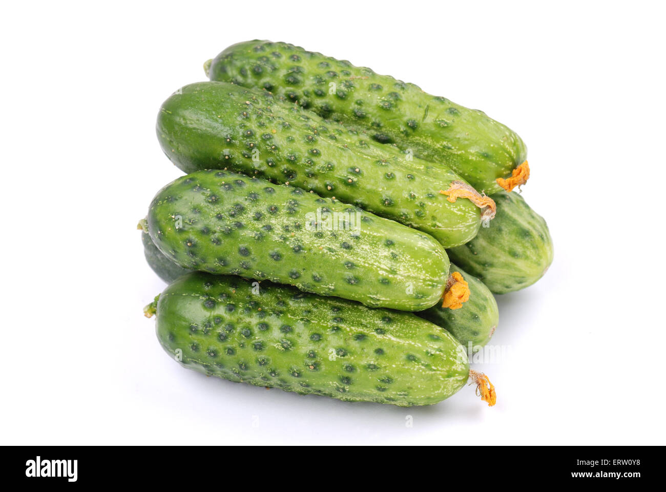 Fresh green cucumbers isolated on white Stock Photo - Alamy
