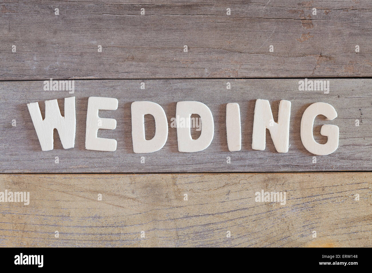 Word wedding written with wood letters over a wooden surface Stock ...