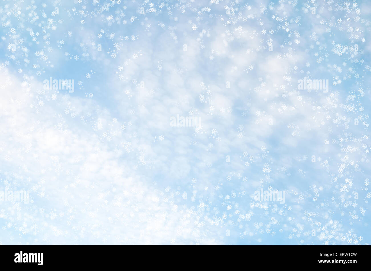 Falling snowflakes on blue background Stock Photo - Alamy