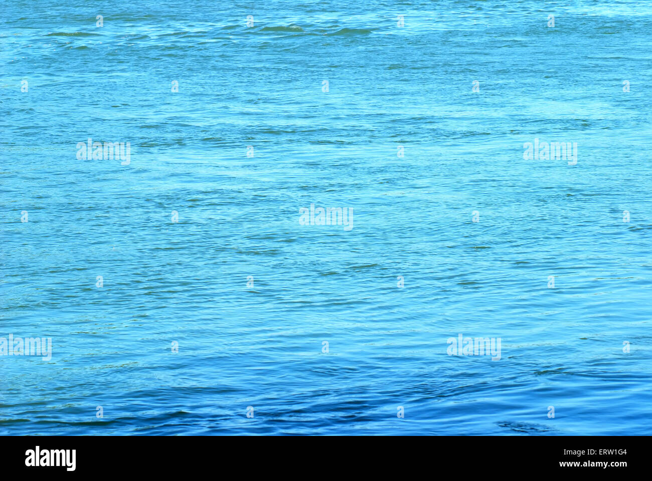 Water background wave of deep blue pond Stock Photo - Alamy