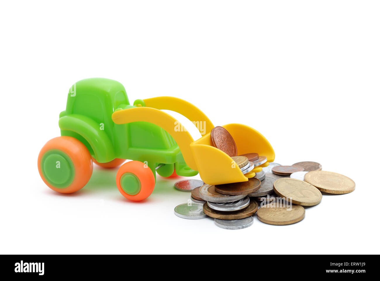 The toy excavator loads money on white background Stock Photo - Alamy