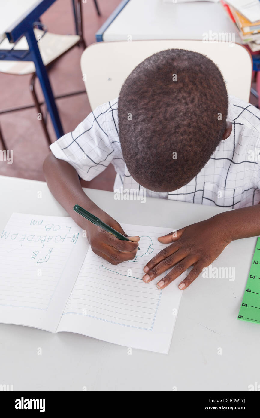 Black boy in the class room Stock Photo - Alamy