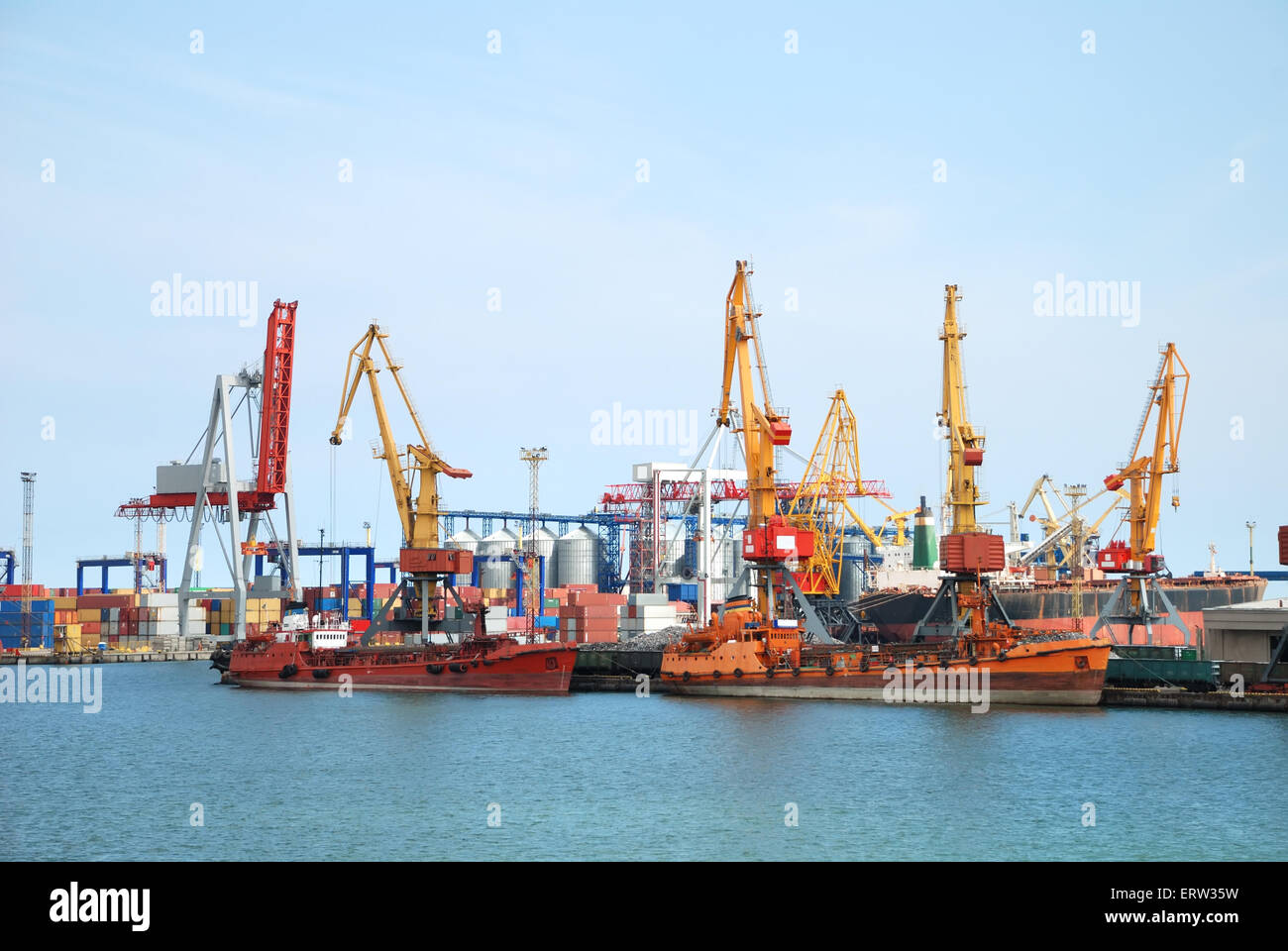 View on trading seaport with cranes, cargoes and the ship Stock Photo ...