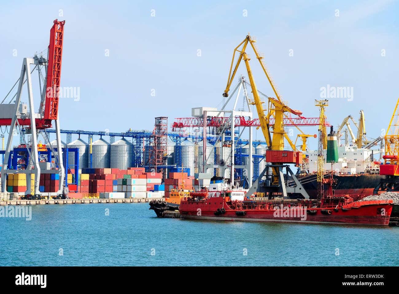 Port warehouse with containers and industrial cargoes Stock Photo - Alamy
