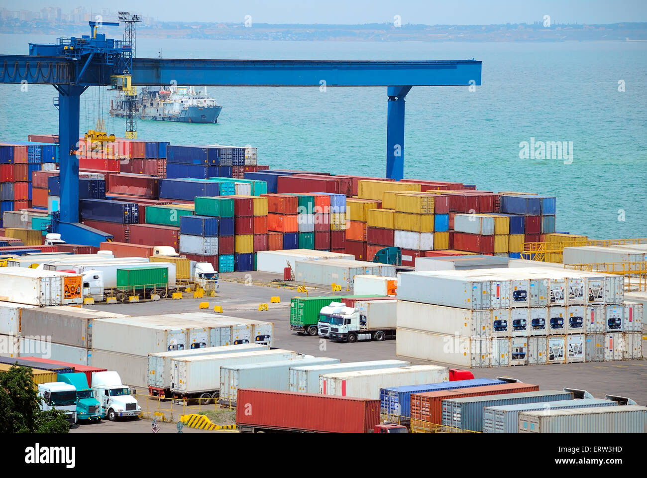 Port warehouse with containers and industrial cargoes Stock Photo - Alamy
