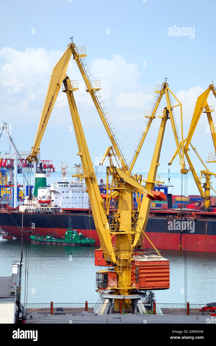 View on trading seaport with cranes, cargoes and the ship Stock Photo ...