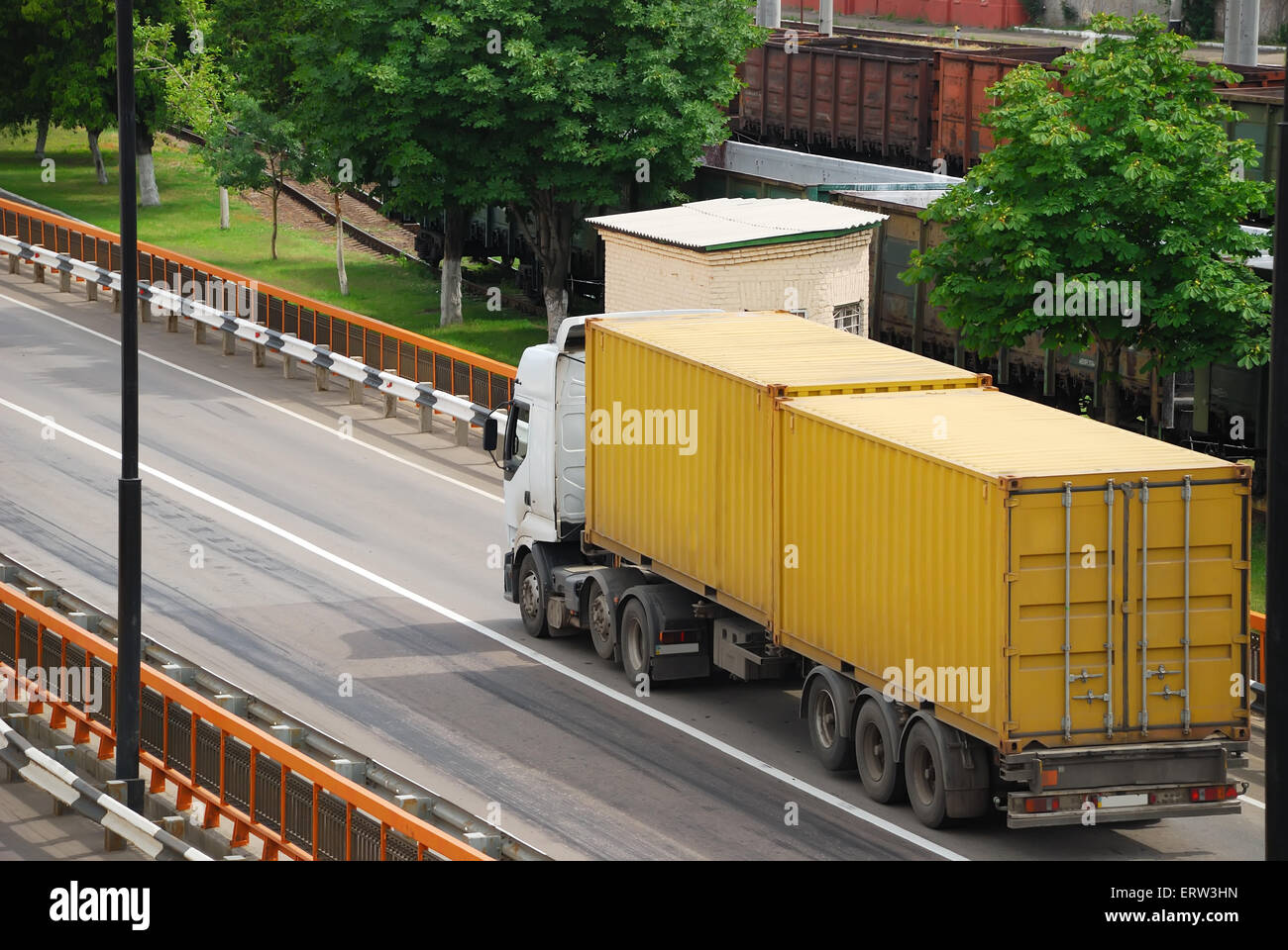 Transportation of cargoes by lorry and railroad Stock Photo - Alamy