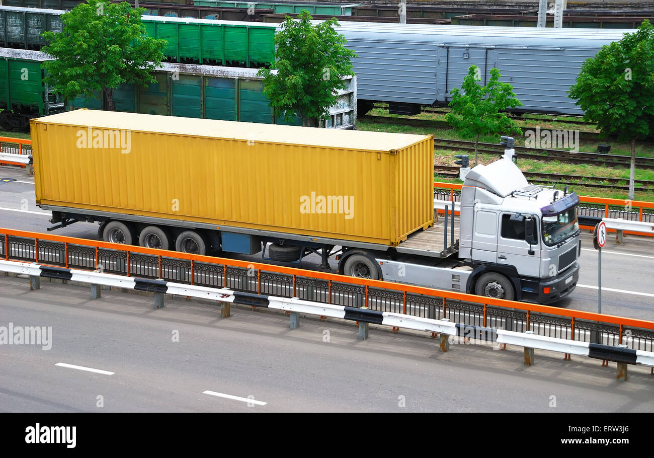 Transportation of cargoes by lorry and railroad Stock Photo - Alamy
