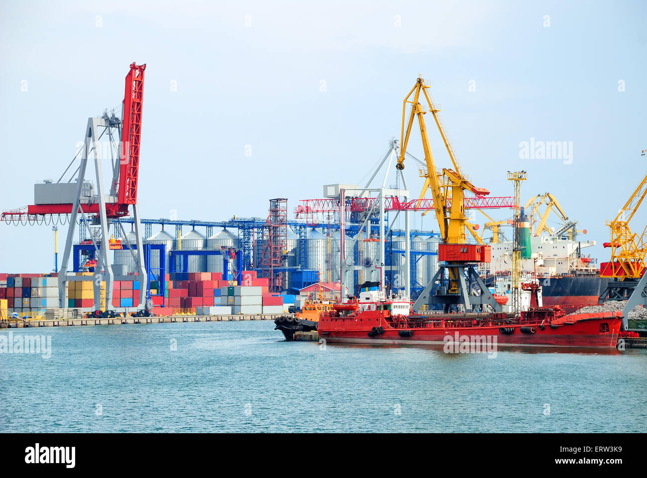 Port warehouse with containers and industrial cargoes Stock Photo - Alamy