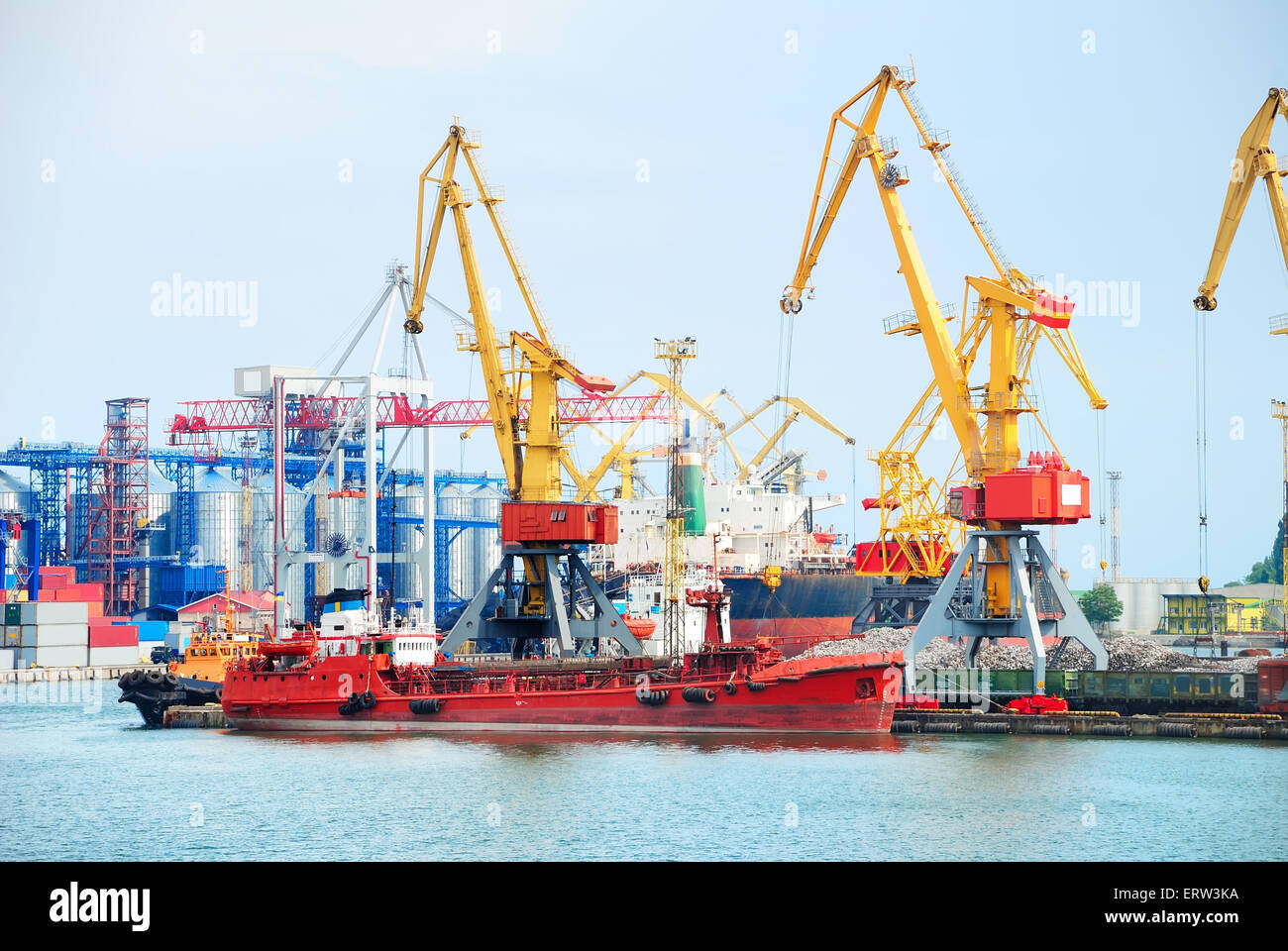 Port warehouse with containers and industrial cargoes Stock Photo - Alamy