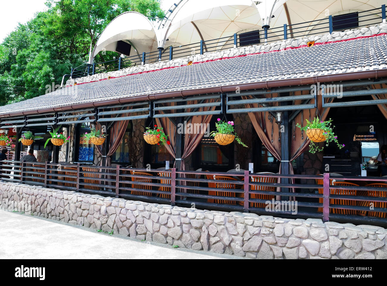 Interior of a summer open-air cafe Stock Photo - Alamy