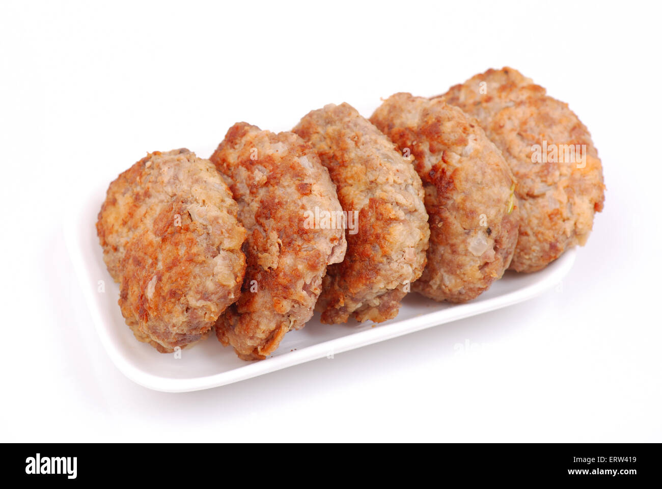meat formed into a ball on a white plate Stock Photo - Alamy