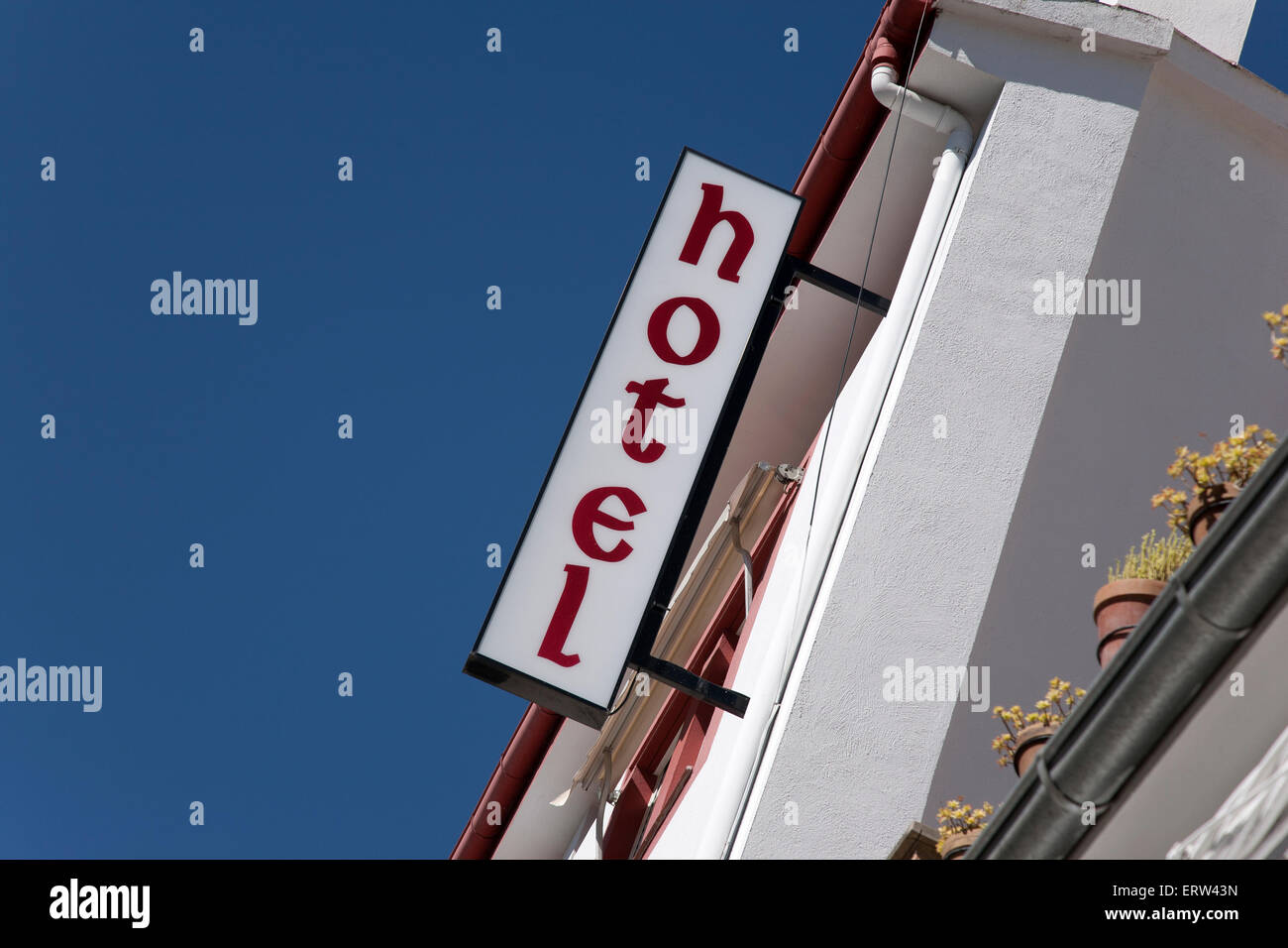 Hotel Sign against Blue Sky Background Stock Photo - Alamy