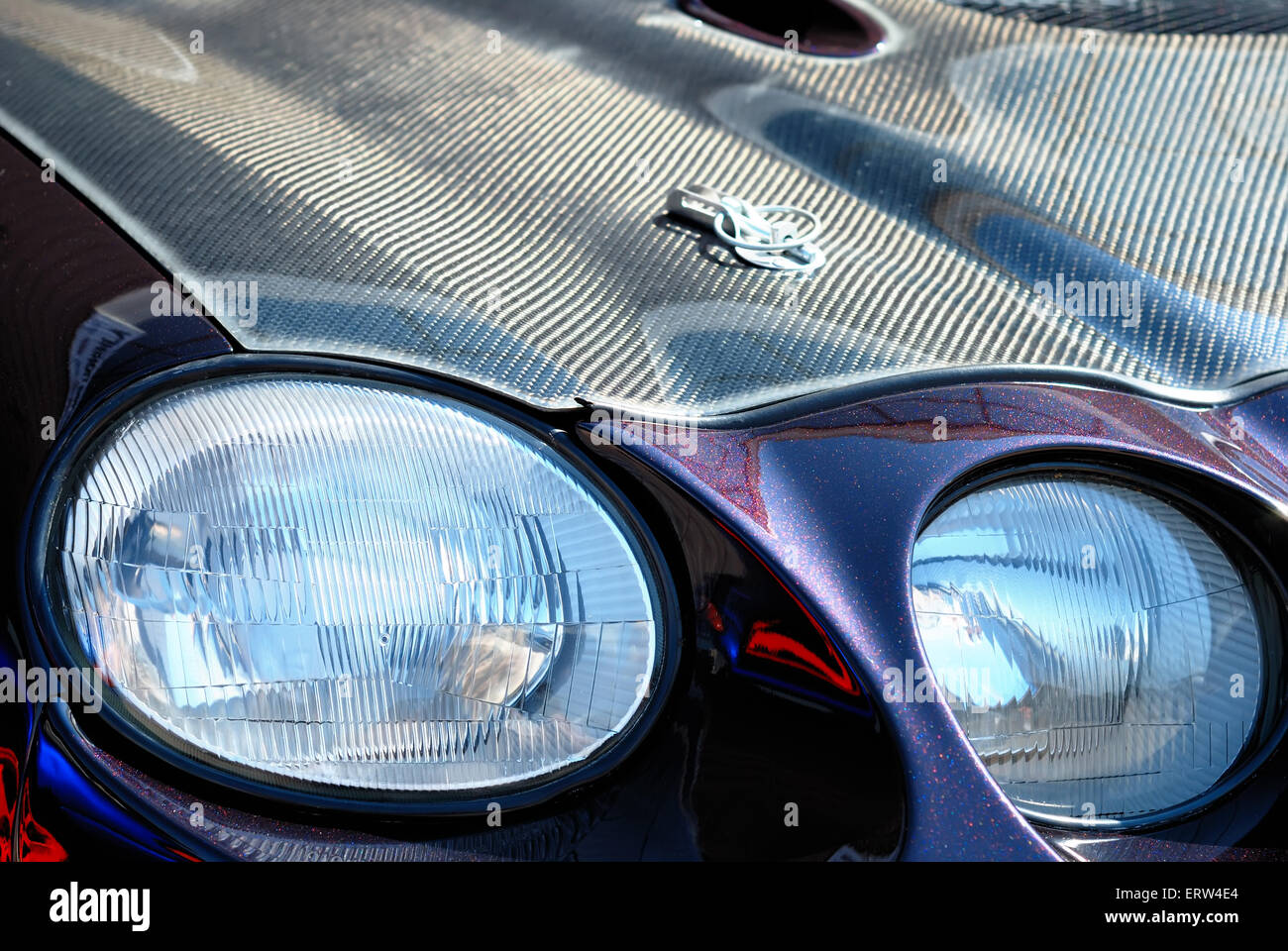 Forward headlight and hood of the racing car Stock Photo - Alamy