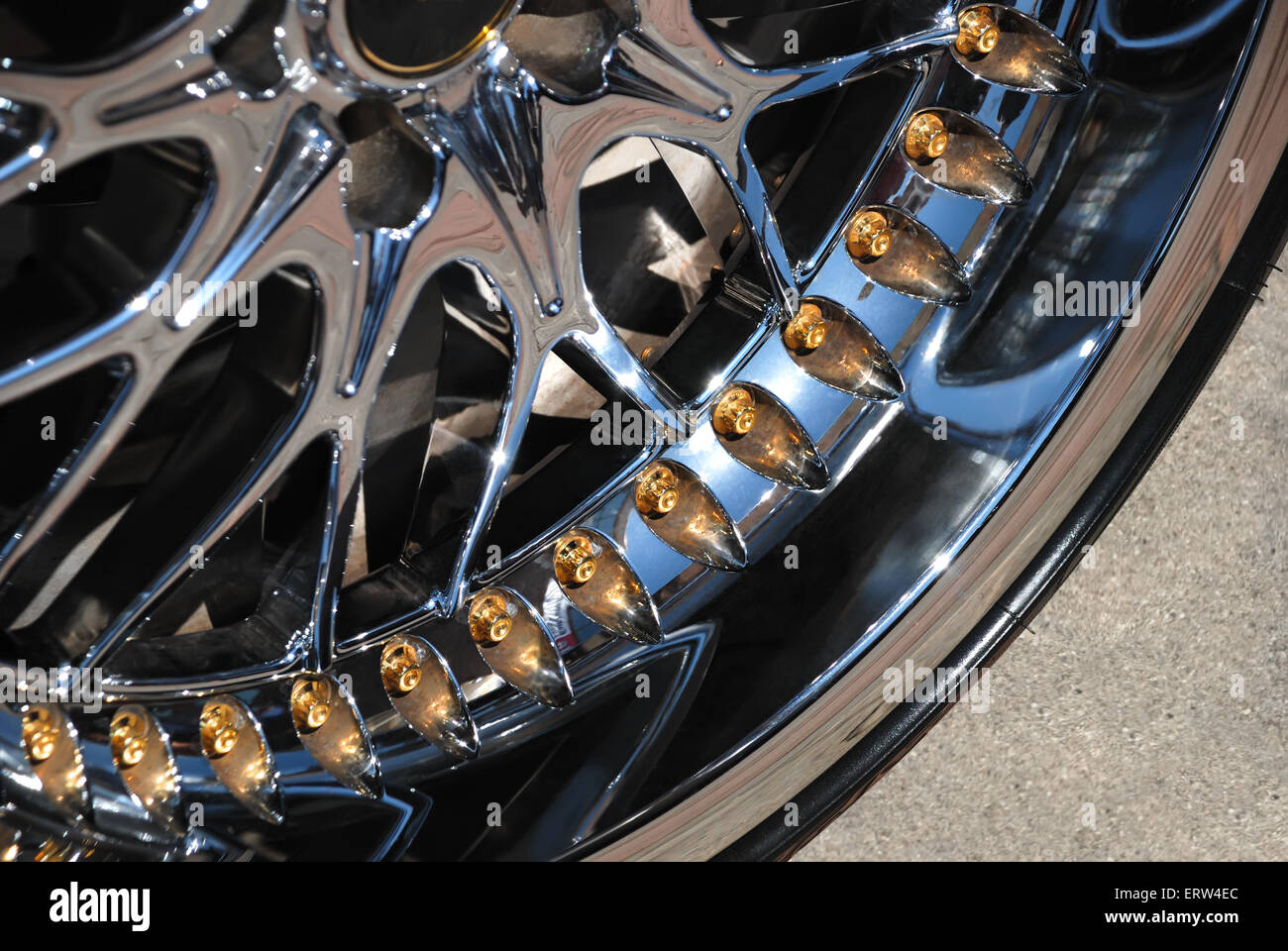 Closeup the chromeplated rim of a wheel Stock Photo - Alamy