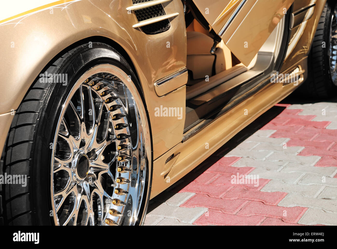 The golden car with an open door Stock Photo - Alamy