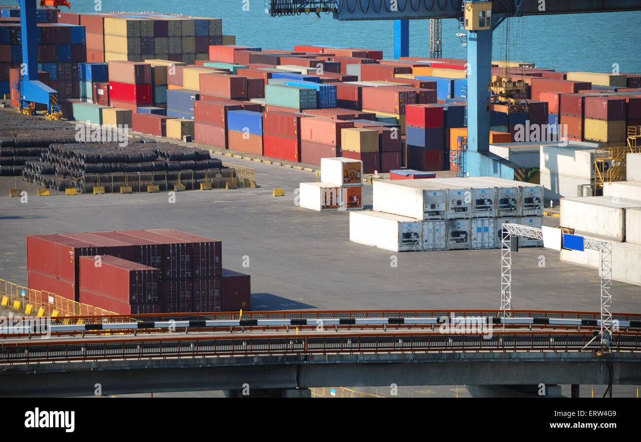Port warehouse with containers and industrial cargoes Stock Photo - Alamy