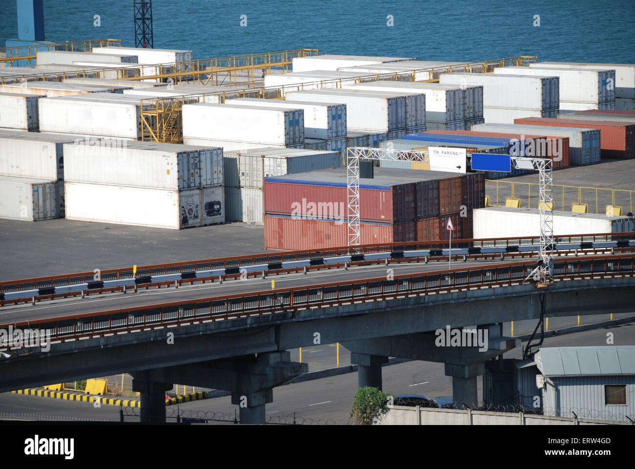 Port warehouse with containers and industrial cargoes Stock Photo - Alamy