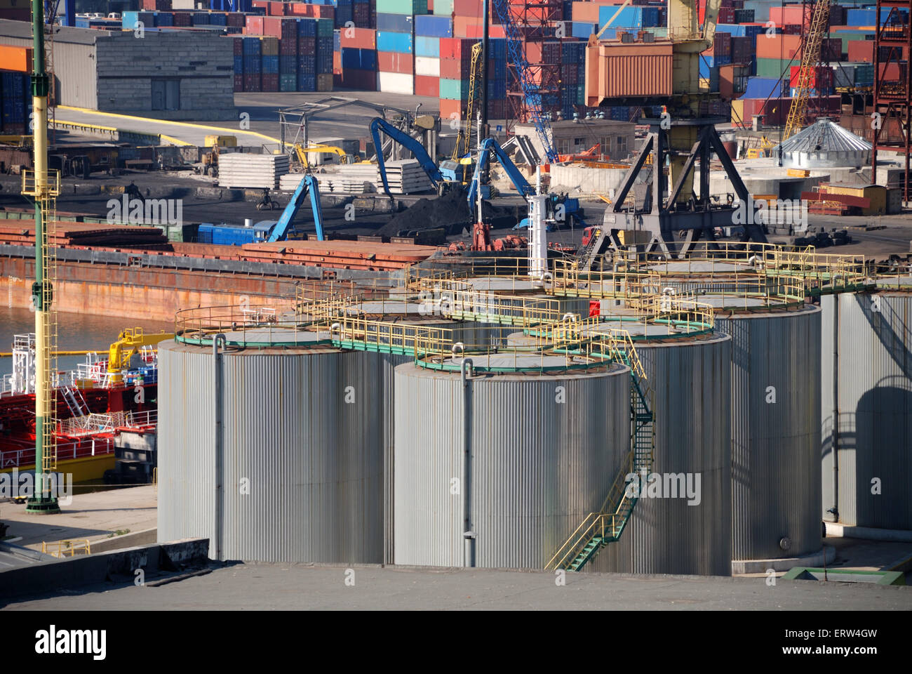 Port warehouse with containers and industrial cargoes Stock Photo - Alamy