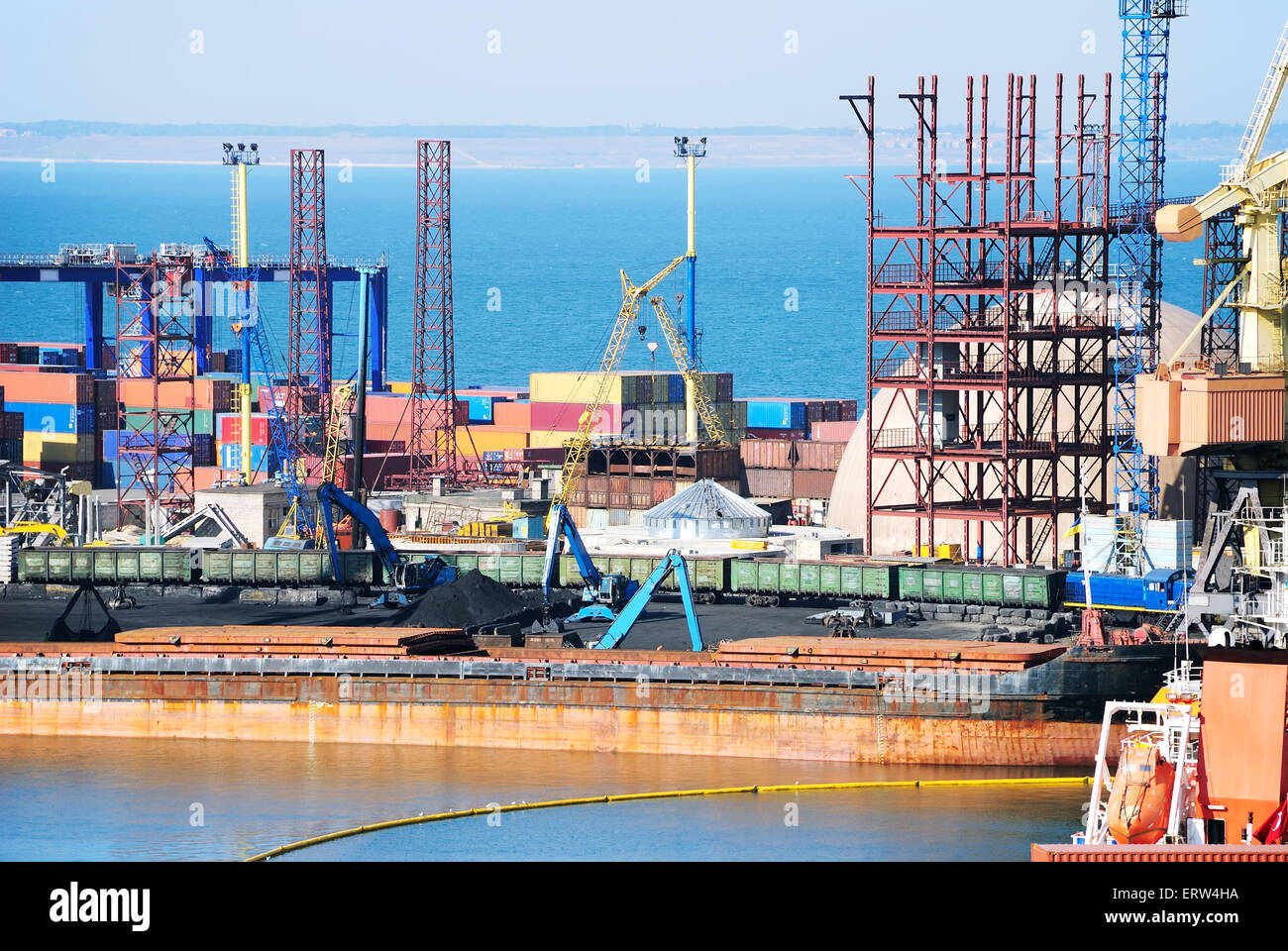View on trading seaport with cranes, cargoes and the ship Stock Photo ...
