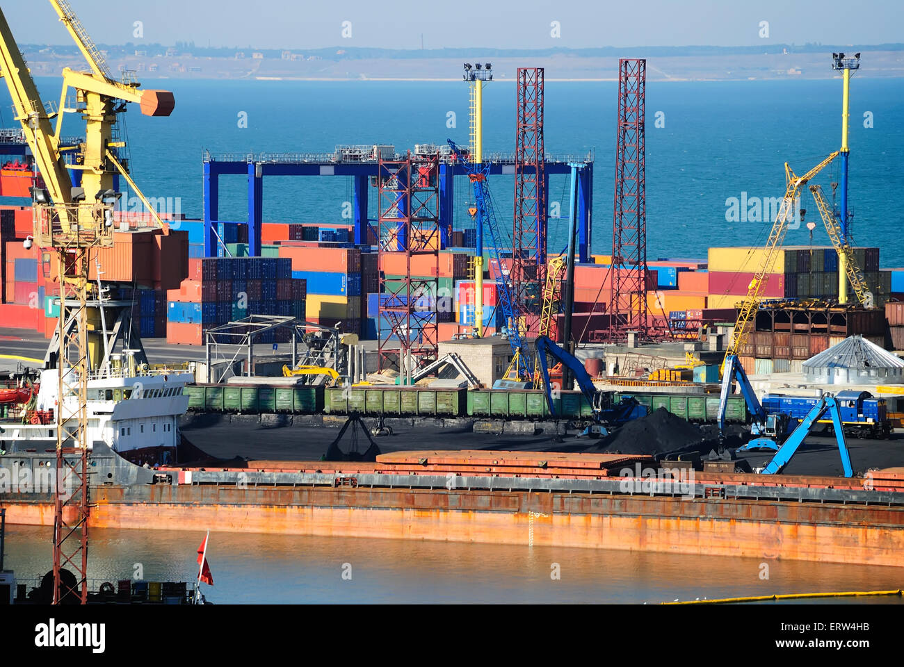 View on trading seaport with cranes, cargoes and the ship Stock Photo ...