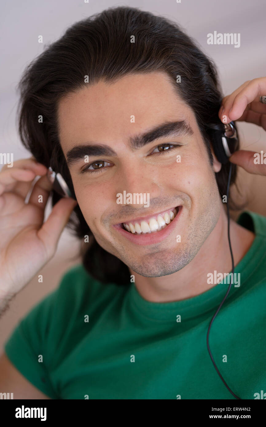 Young man with headphones Stock Photo - Alamy
