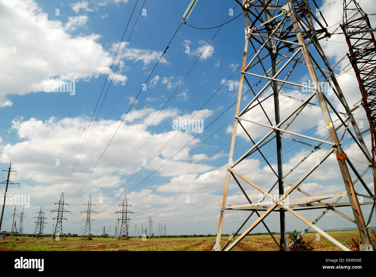 High voltage electric line at the field Stock Photo - Alamy
