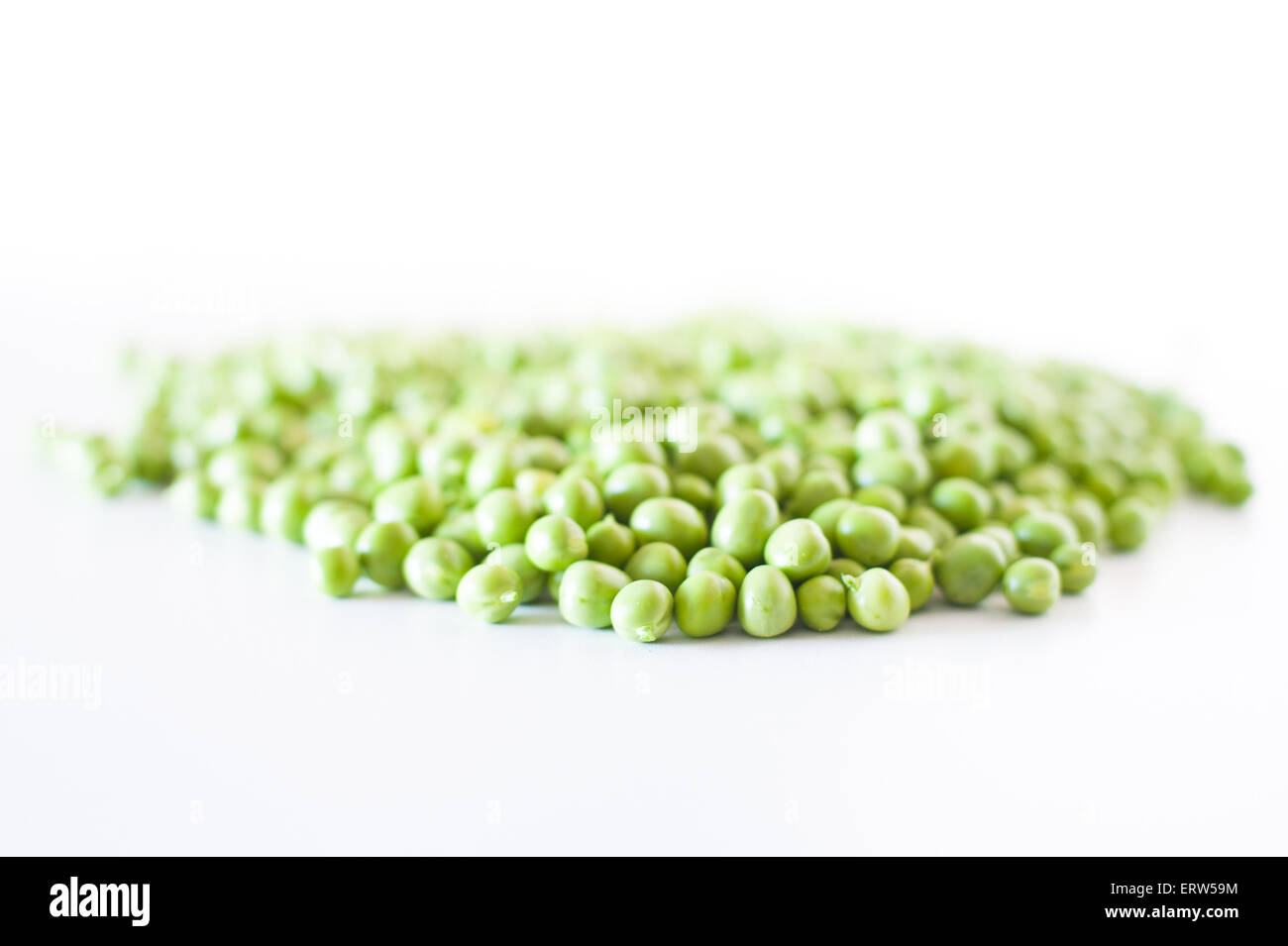 Heap of fresh peas isolated on white background selective focus Stock ...