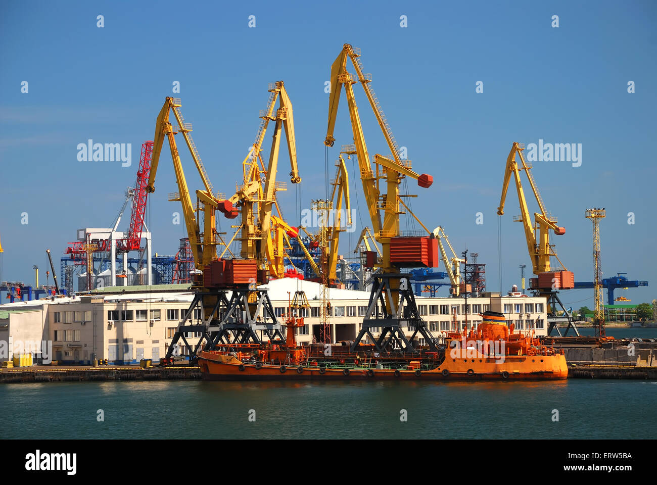View on trading seaport with cranes, cargoes and the ship Stock Photo ...