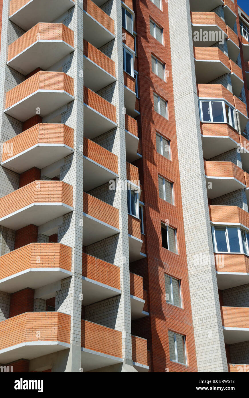 Facade of a condominium of coming to the end building Stock Photo - Alamy