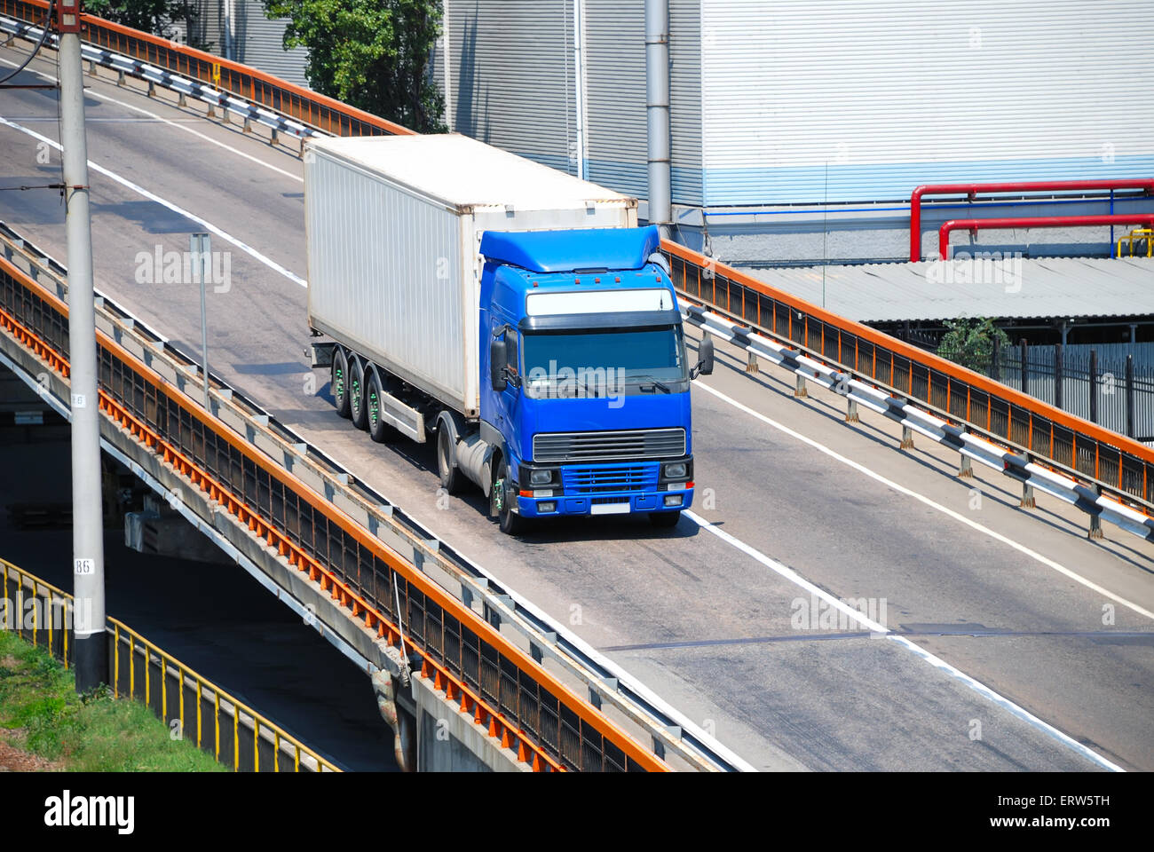 Transportation of cargoes in containers by lorry Stock Photo - Alamy