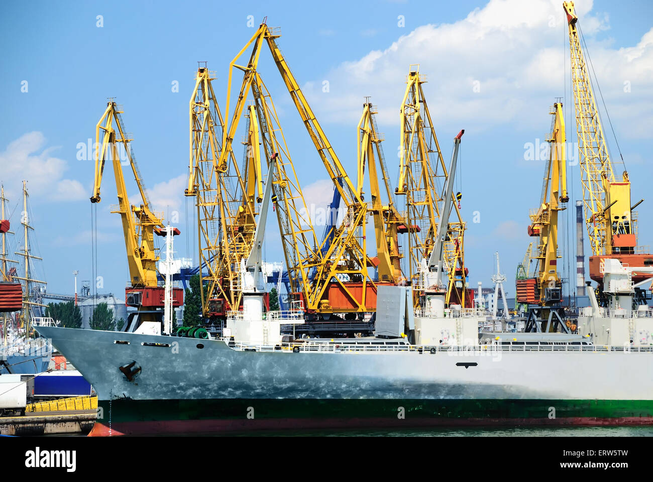 Port warehouse with containers and industrial cargoes Stock Photo - Alamy