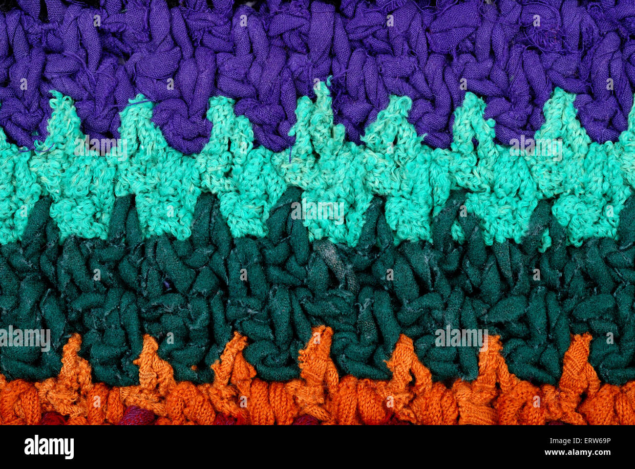 Abstract background from homemade multi colored carpet Stock Photo - Alamy