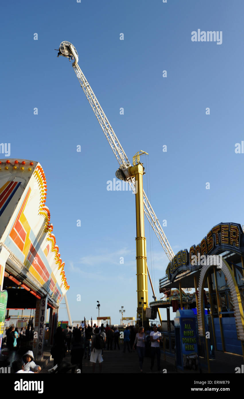 Brighton UK June 2015 - People enjoy the Booster fairground ride on ...