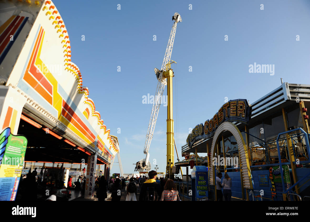 Brighton UK June 2015 - People enjoy the Booster fairground ride on ...
