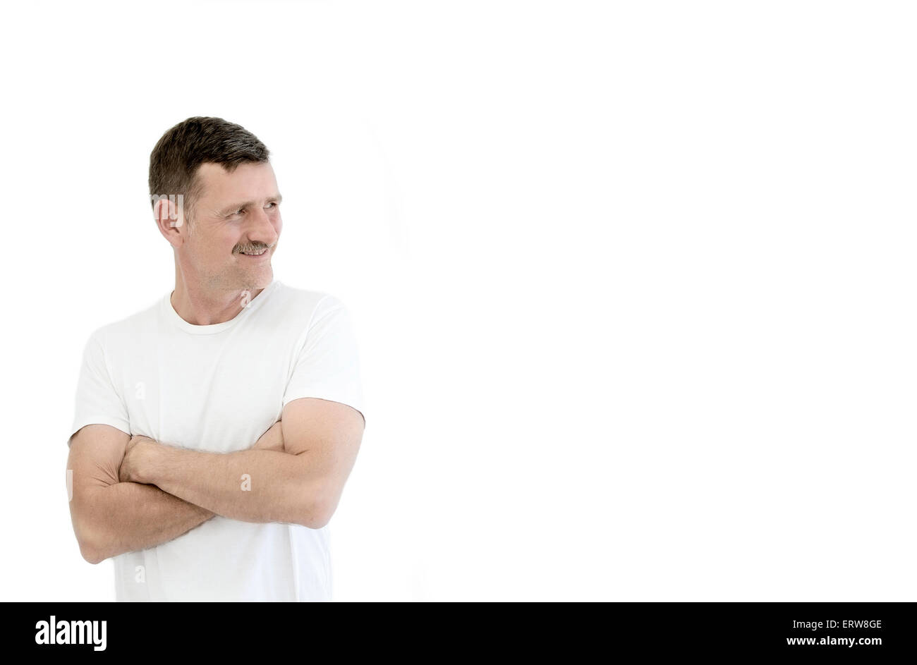 Portrait of a man looking to the side and smiles Stock Photo - Alamy