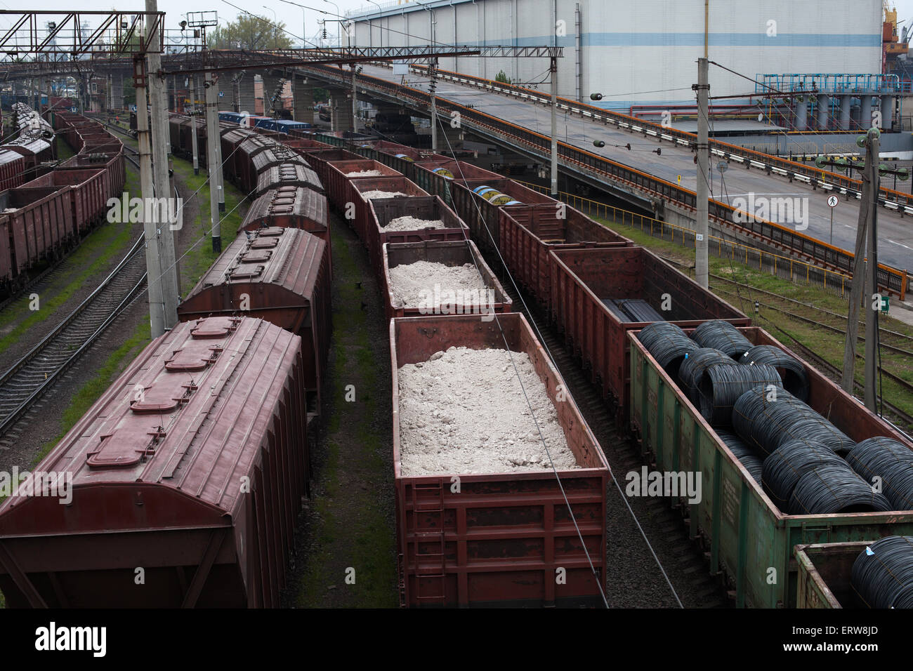Freight trains on city cargo terminal Stock Photo - Alamy