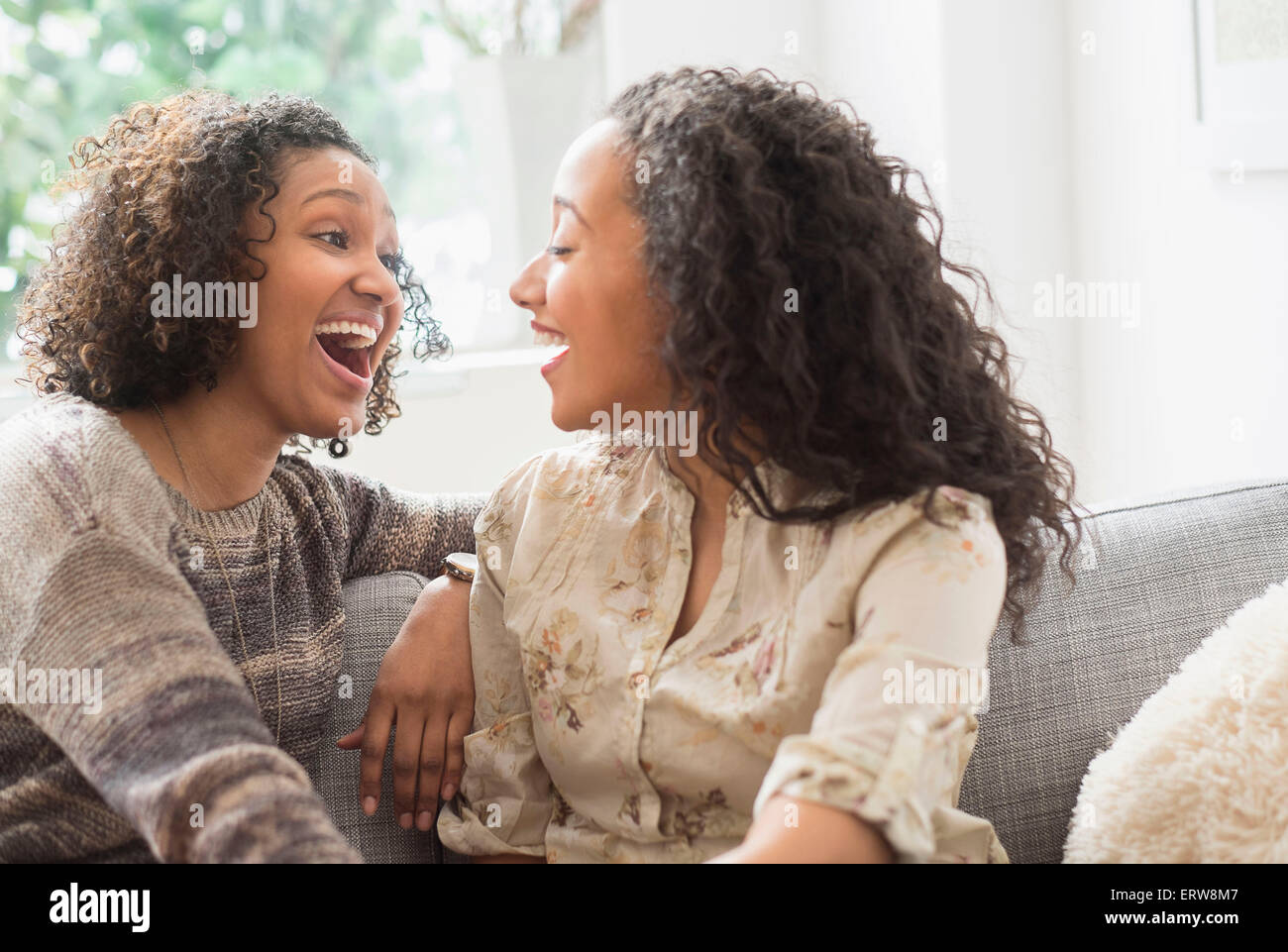 Two women talking sofa couch hi-res stock photography and images - Alamy