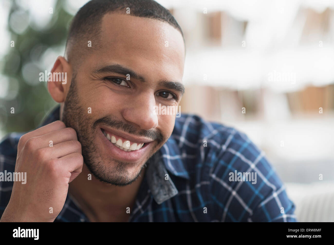 Close up of Hispanic man smiling Stock Photo - Alamy